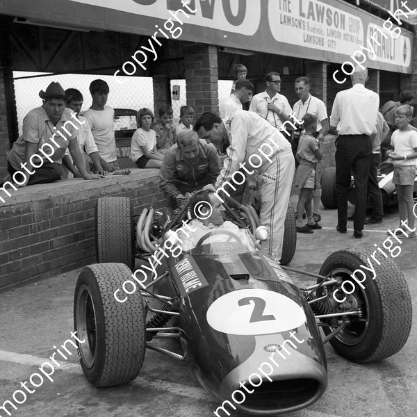 1967 SA GP Denny Hulme Brabham BT20_ Jack Branham at engine (courtesy ...